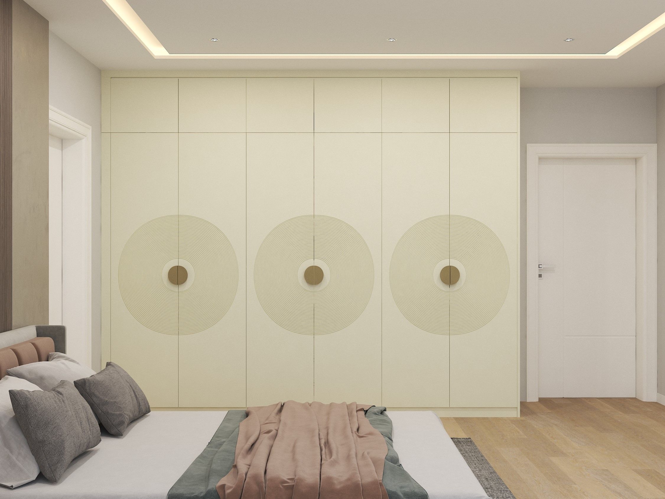 Wardrobe with engraved circular motifs and round gold handles